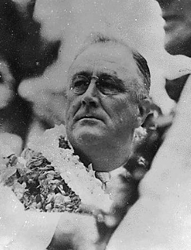 FDR adorned with flower leis – Forward with Roosevelt